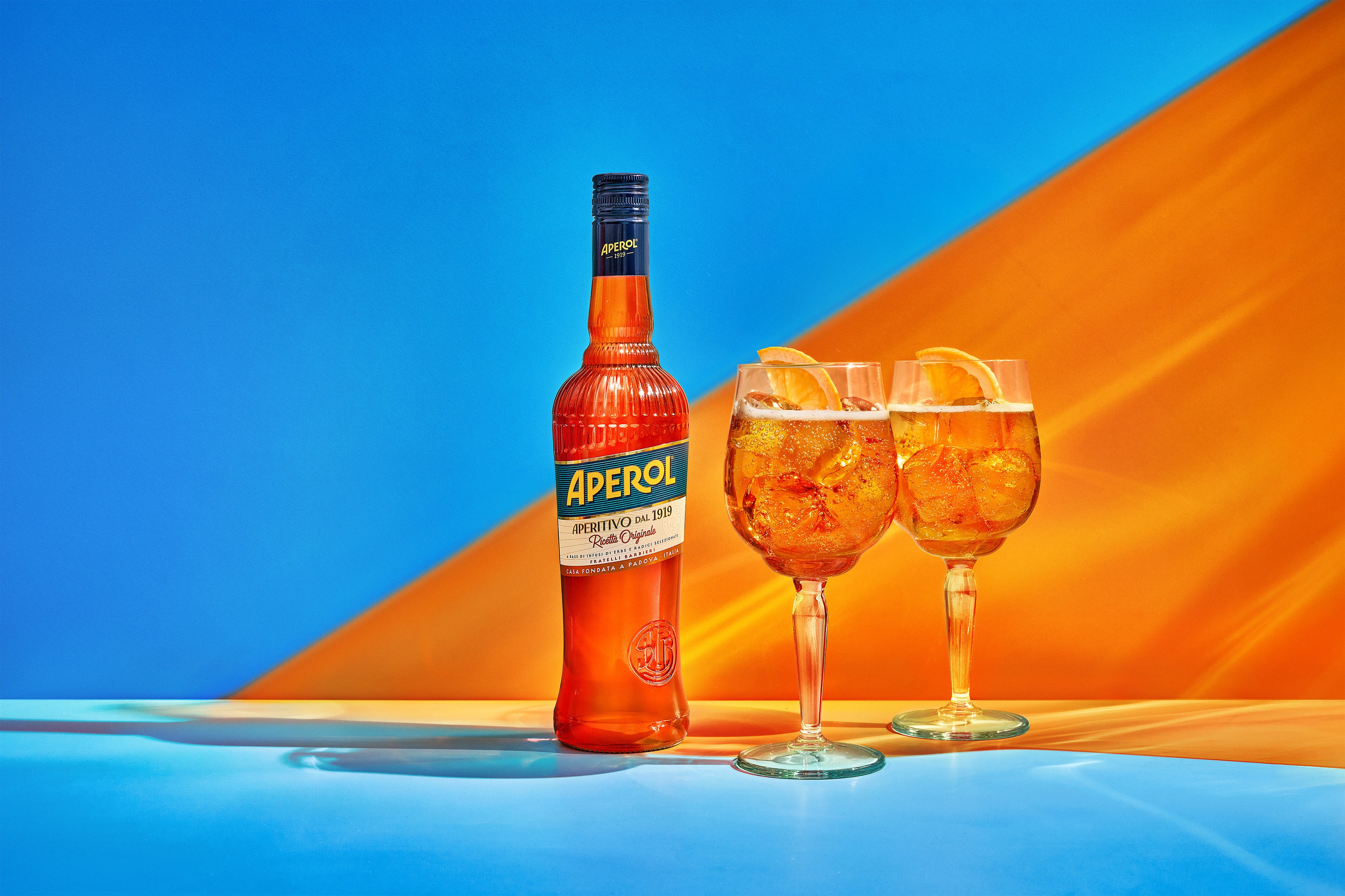 Aperol Refreshes Its Iconic Bottle Design for the First Time - Holiday ...